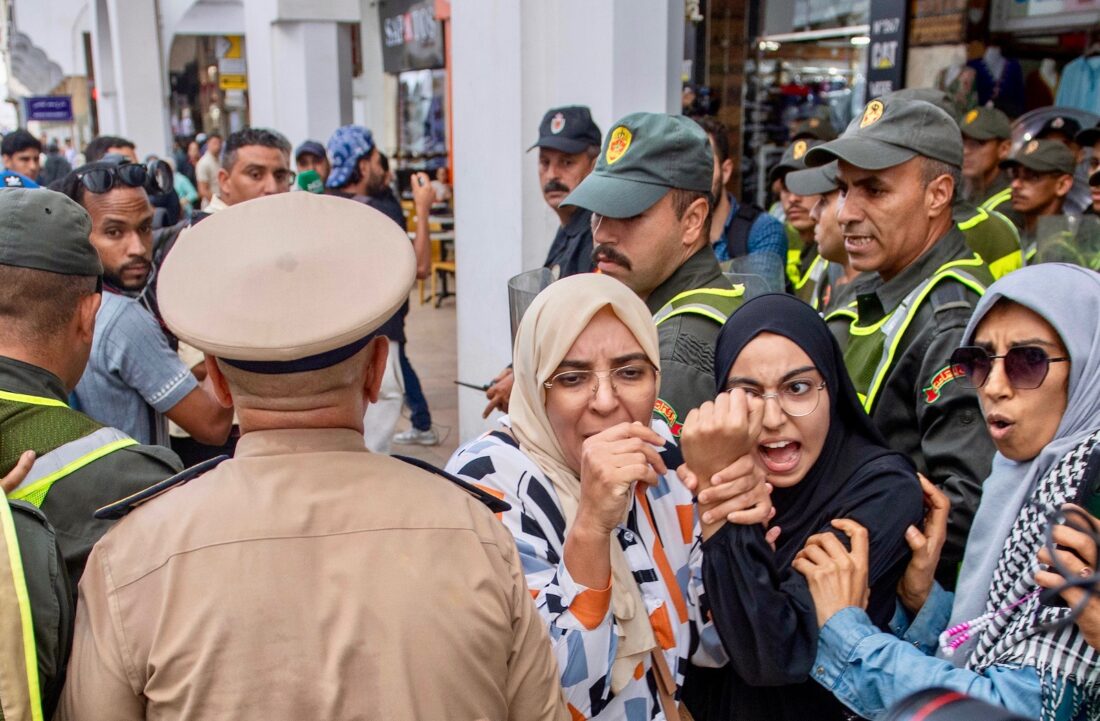 Young Moroccans clash with police while protesting stadium spending and ...